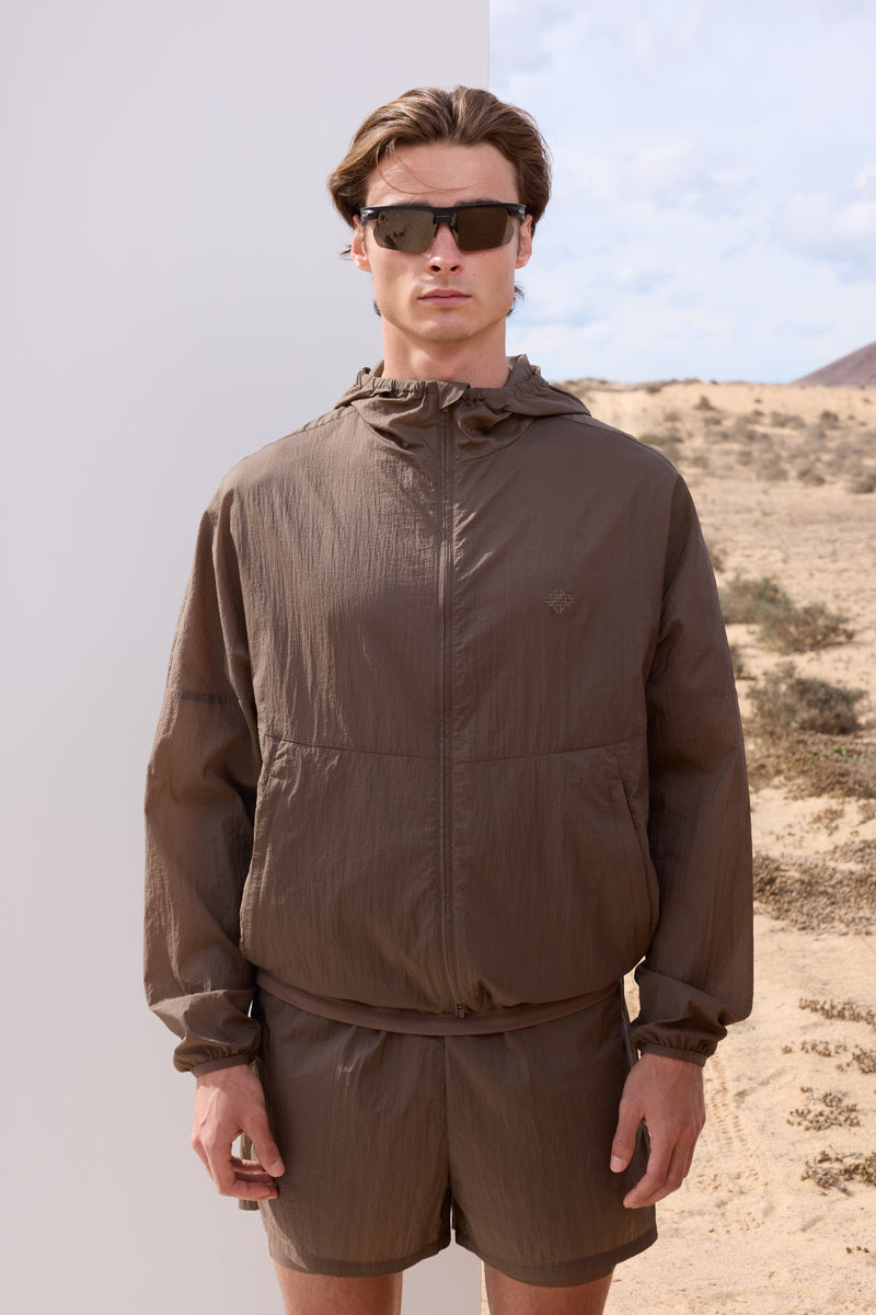 TRANSLUCENT WINDBREAKER - BROWN – The Couture Club