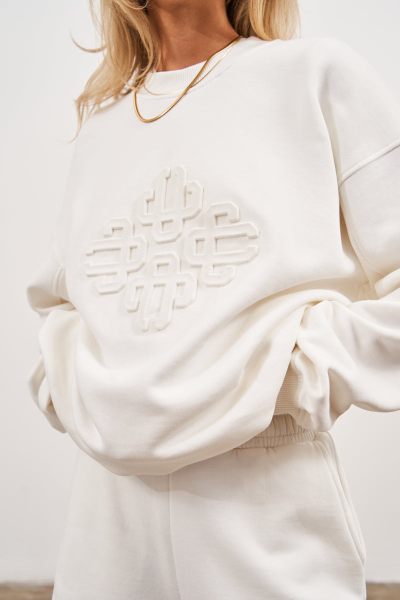 EMBLEM EMBOSSED OVERSIZED SWEATSHIRT - OFF WHITE – The Couture Club