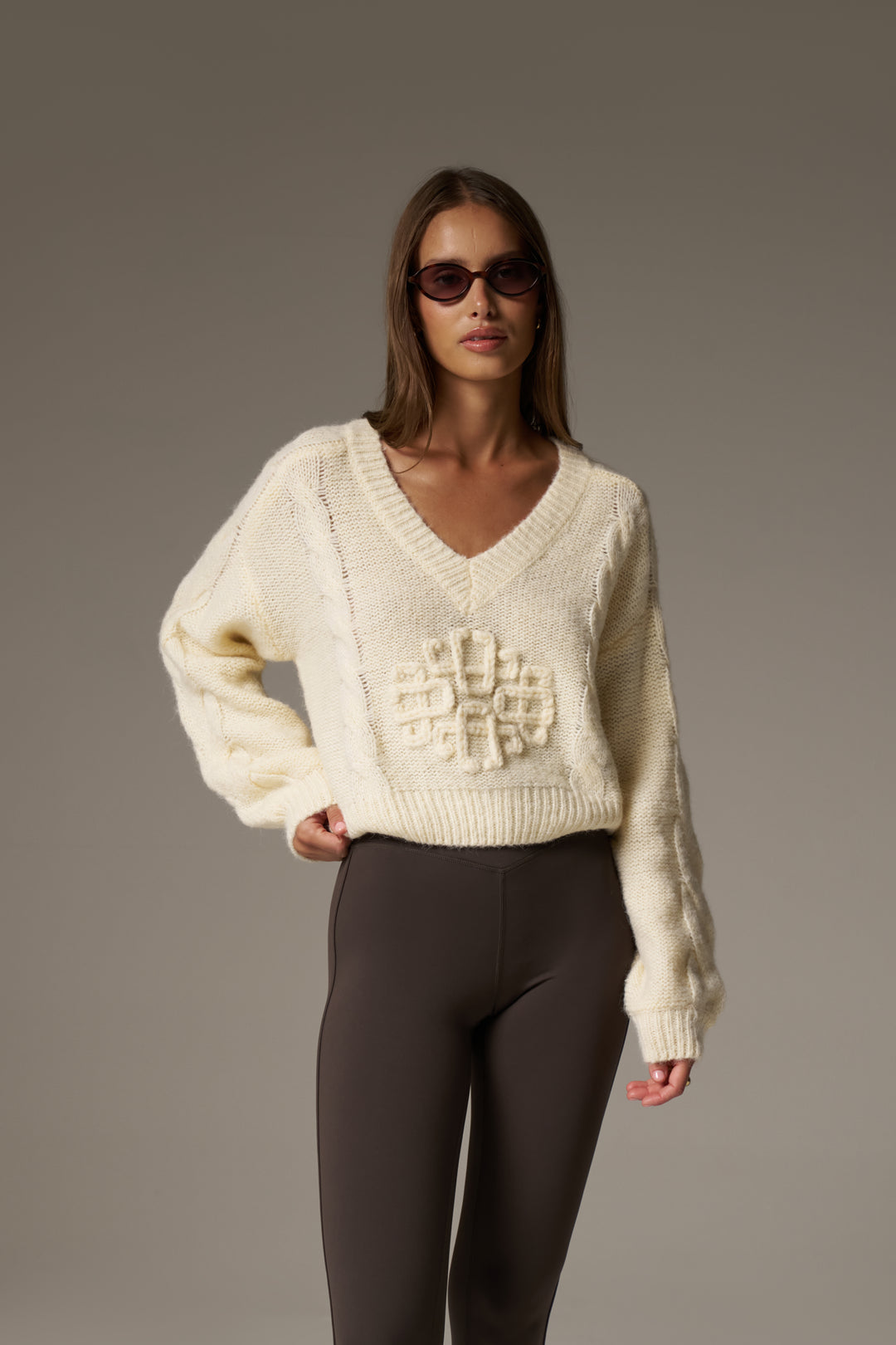 EMBLEM KNITTED V NECK JUMPER - BUTTERMILK – The Couture Club