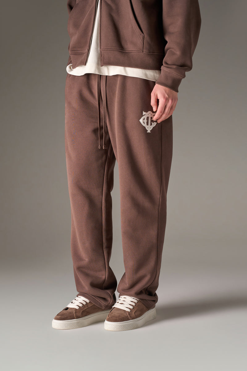 HEAVYWEIGHT MONOGRAM APPLIQUE EMBLEM JOGGERS - BROWN – The Couture Club