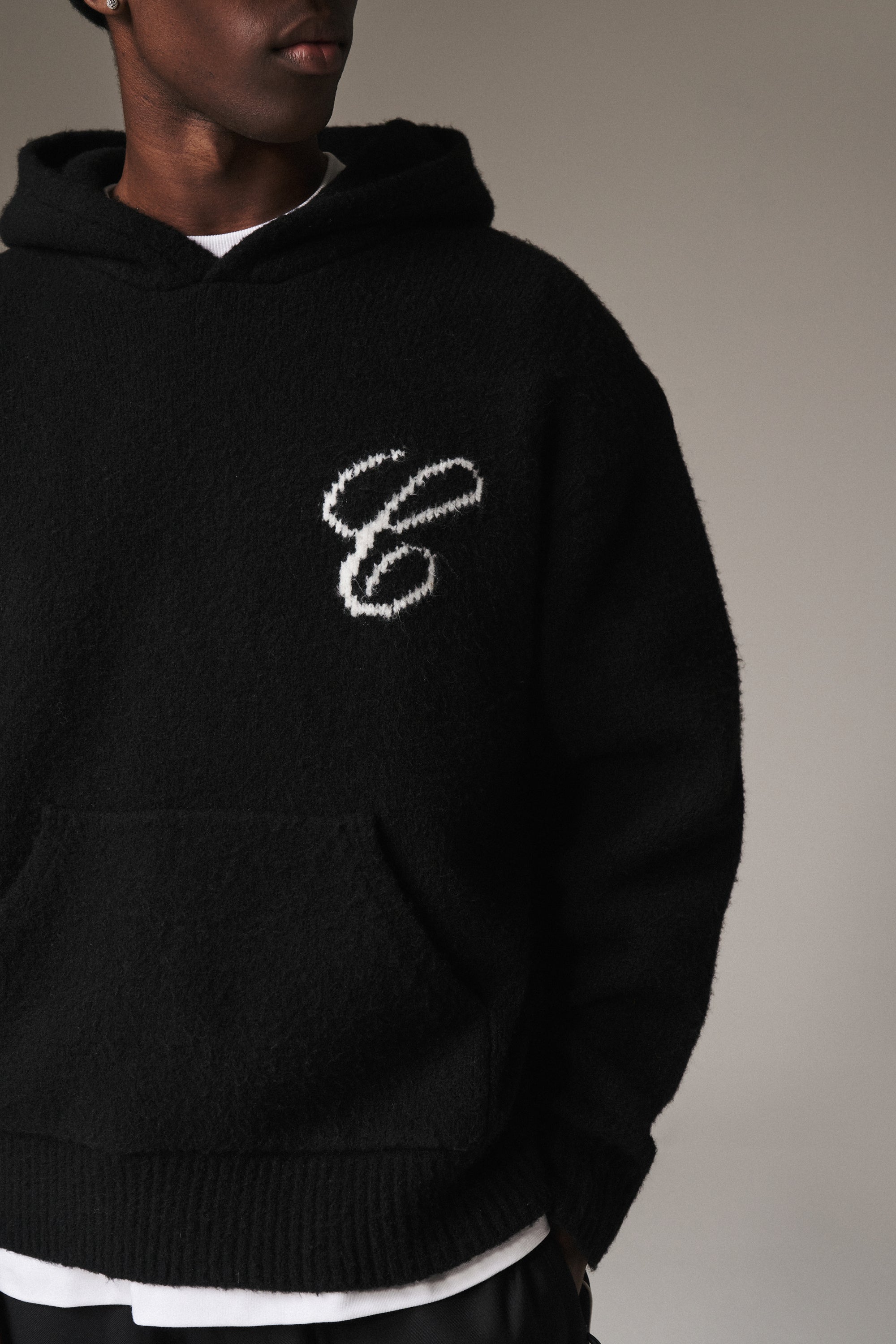 SCRIPT LOGO GRAPHIC KNITTED HOODIE - BLACK – The Couture Club